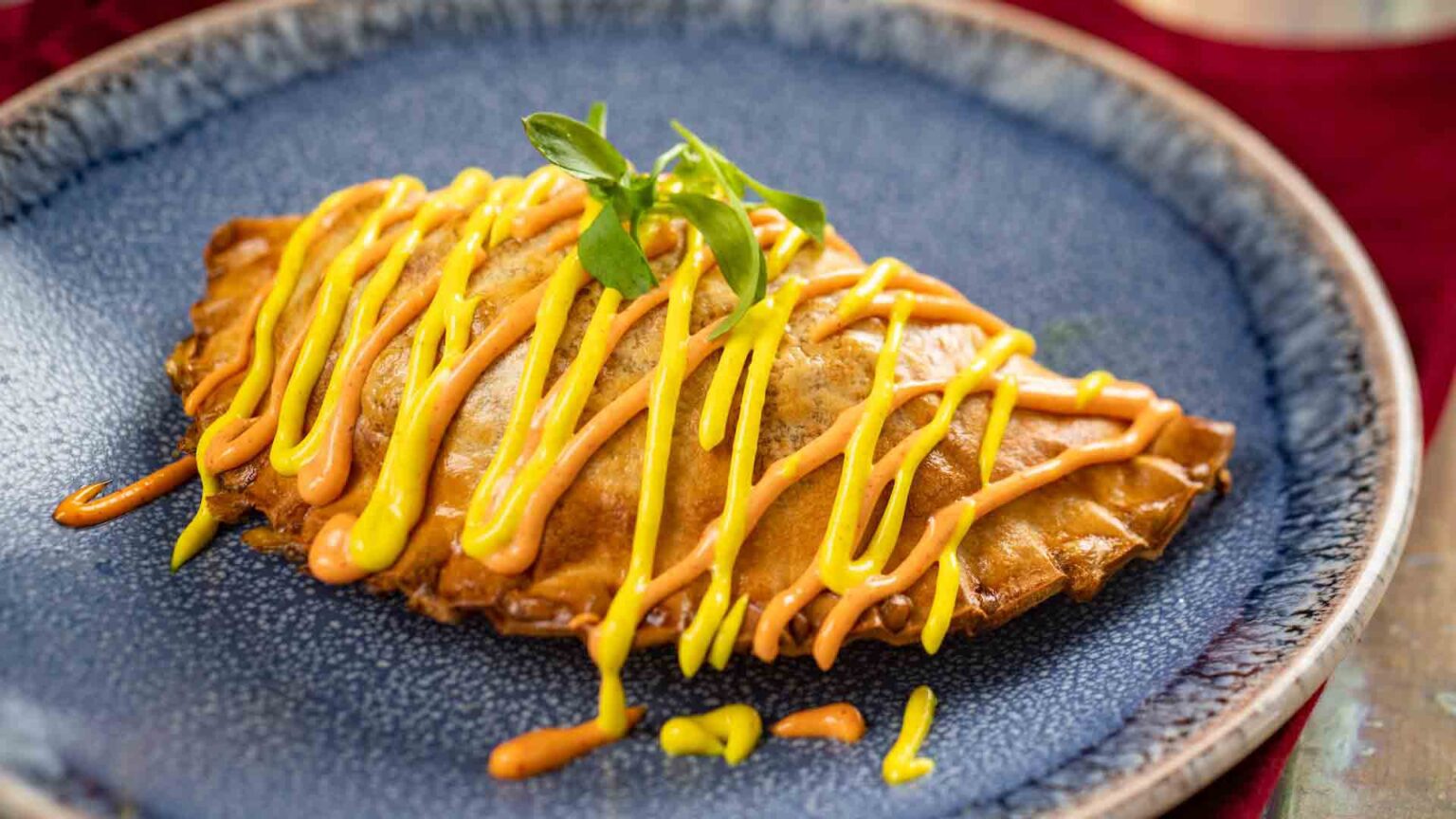 2026-WDW-FOTA-Foodie-Guide-Empanada – DisneyLists.com